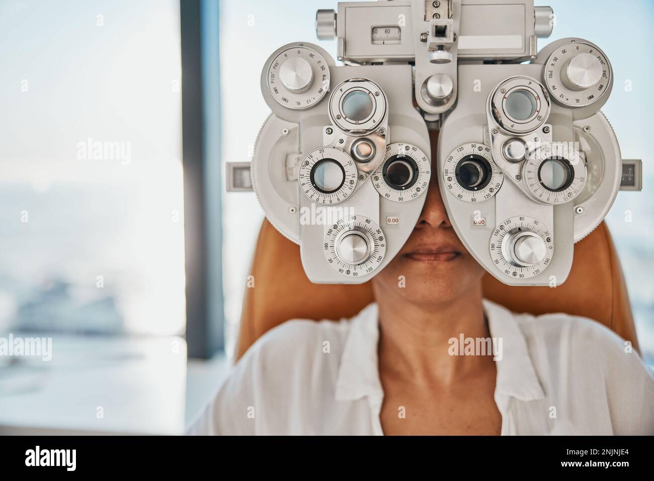 Vision, eye exam and woman in optometry test for wellness, eyesight and ...