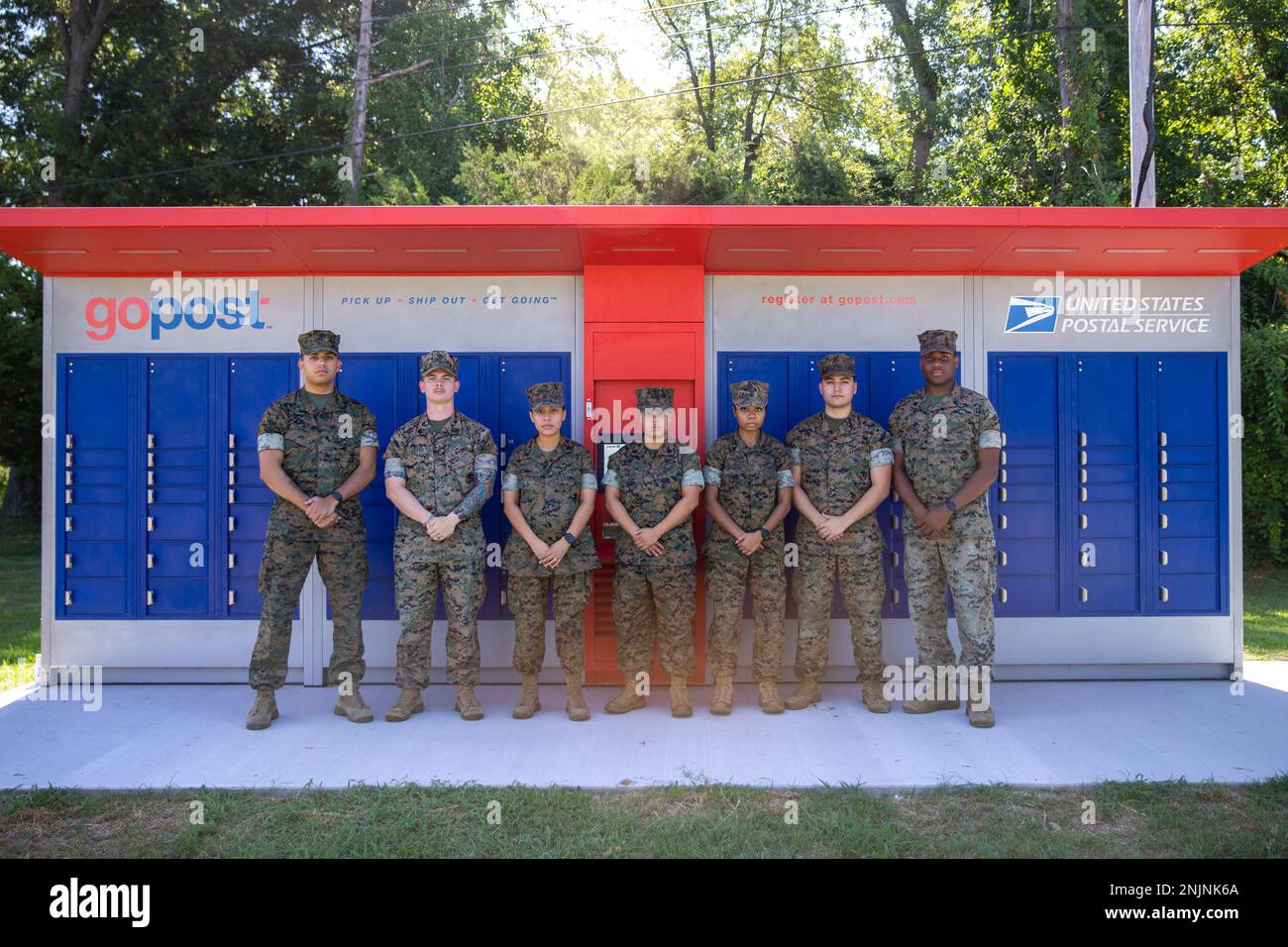 U.S. Marines with the Post Office pose for a photo on Marine Corps Base ...