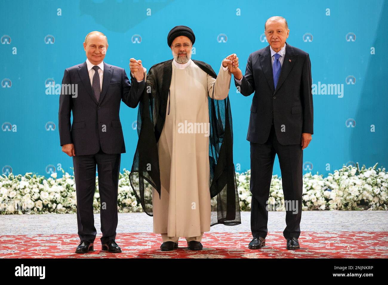 Russian President Vladimir Putin, from left, Iranian President Ebrahim ...