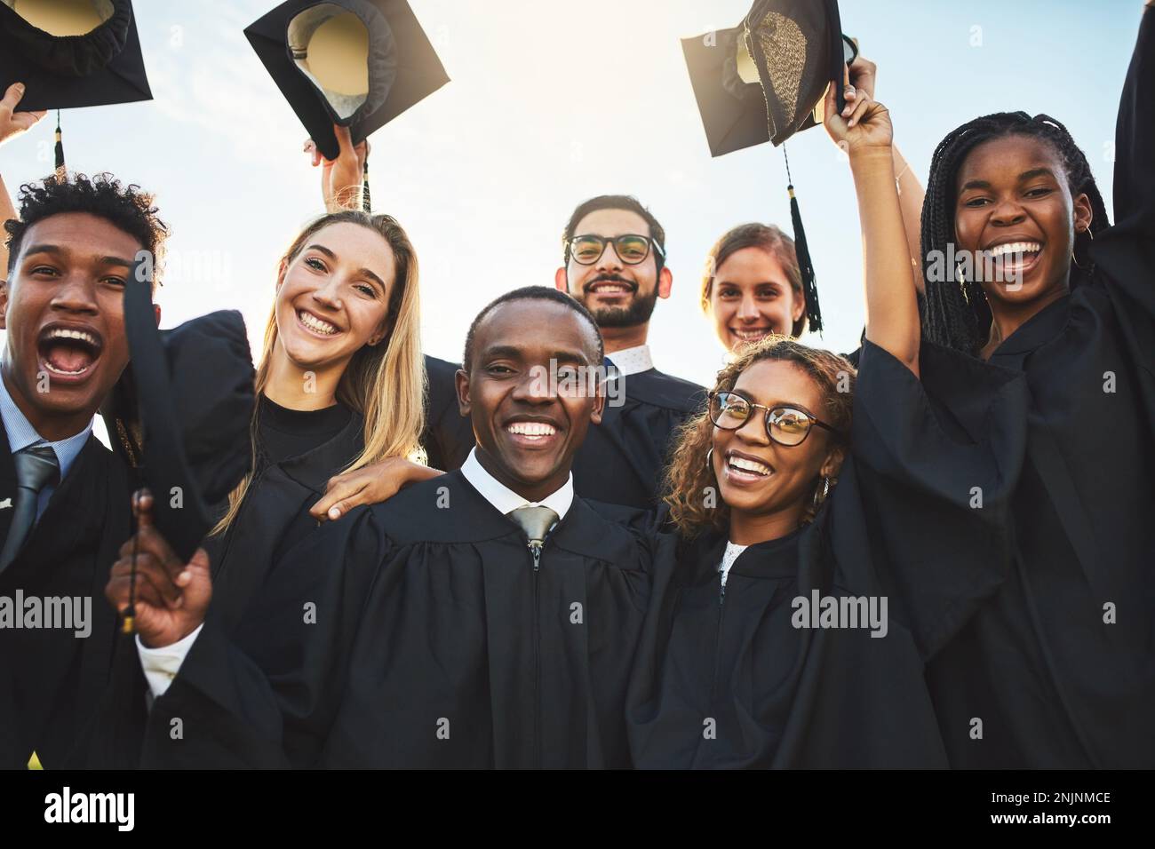 Celebrating a great achievement. a group of cheerful university ...