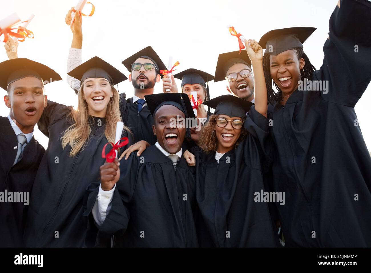 Theres no stopping our big ambitions. Portrait of a group of university ...