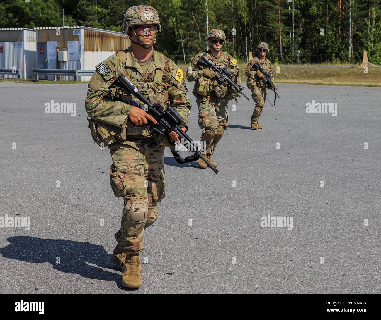 From the left, Spc. Cody Matonik, Spc. Tyler Graessle and Spc ...