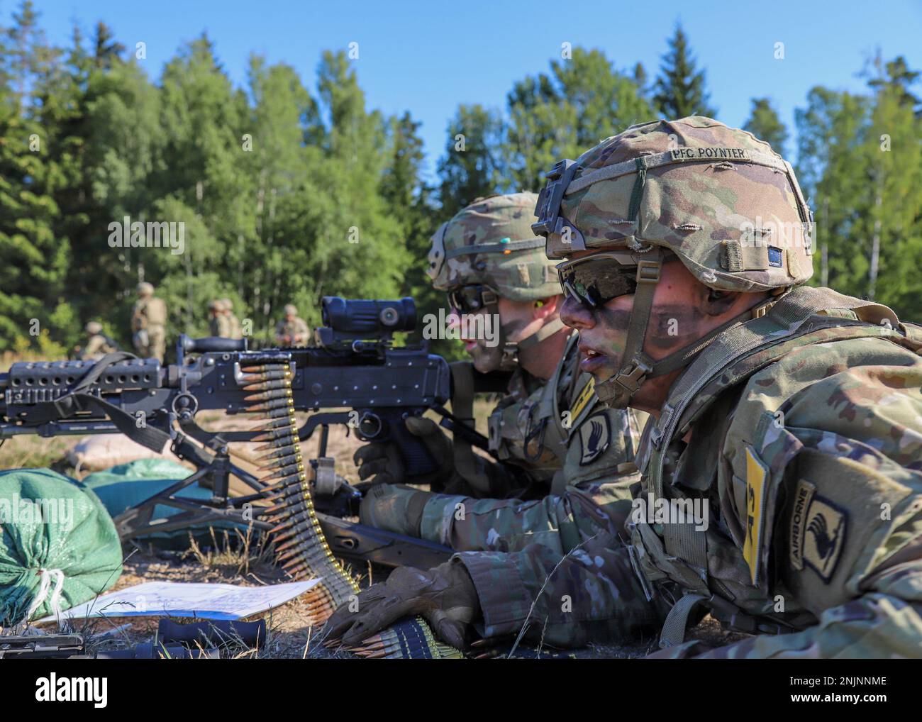 Spc. Tyler Graessle, left, and Spc. Sebastian Poynter, both competing ...