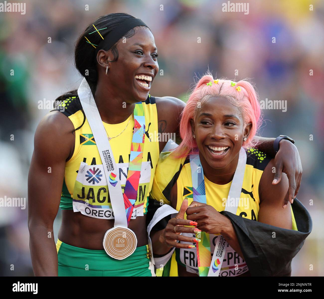 Shericka Jackson (L) and Shelly-Ann Fraser-Pryce of Jamaica reacts ...