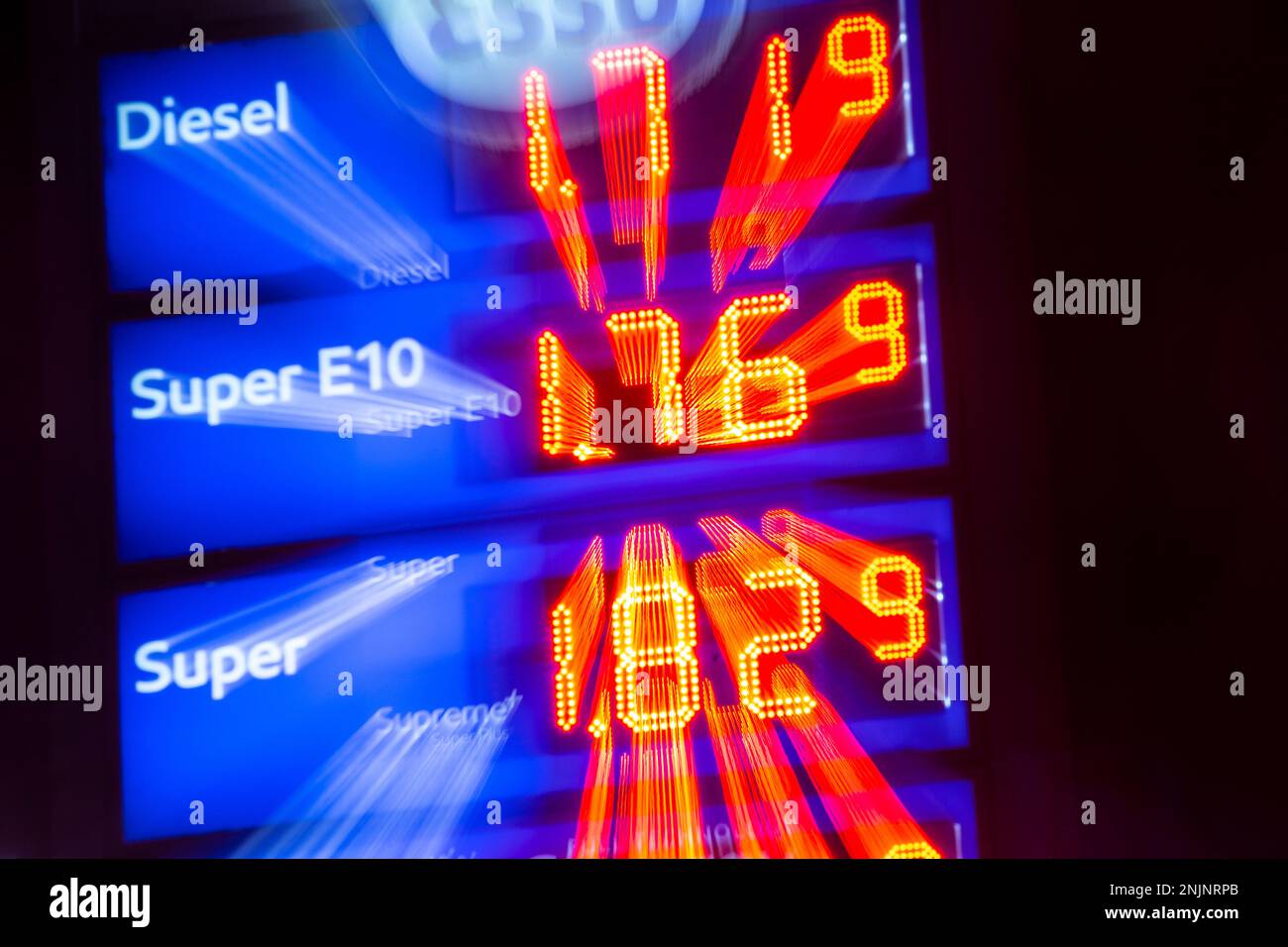 Cologne, Germany. 23rd Feb, 2023. Illuminated signs show the prices for ...