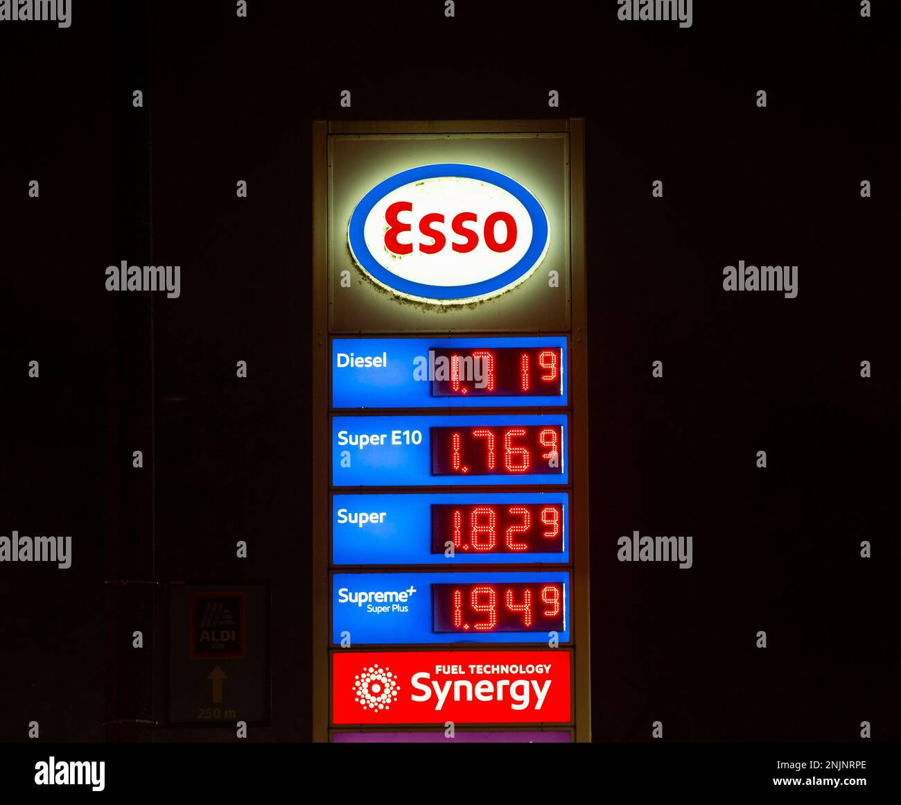 Cologne, Germany. 23rd Feb, 2023. Illuminated signs show the prices for ...