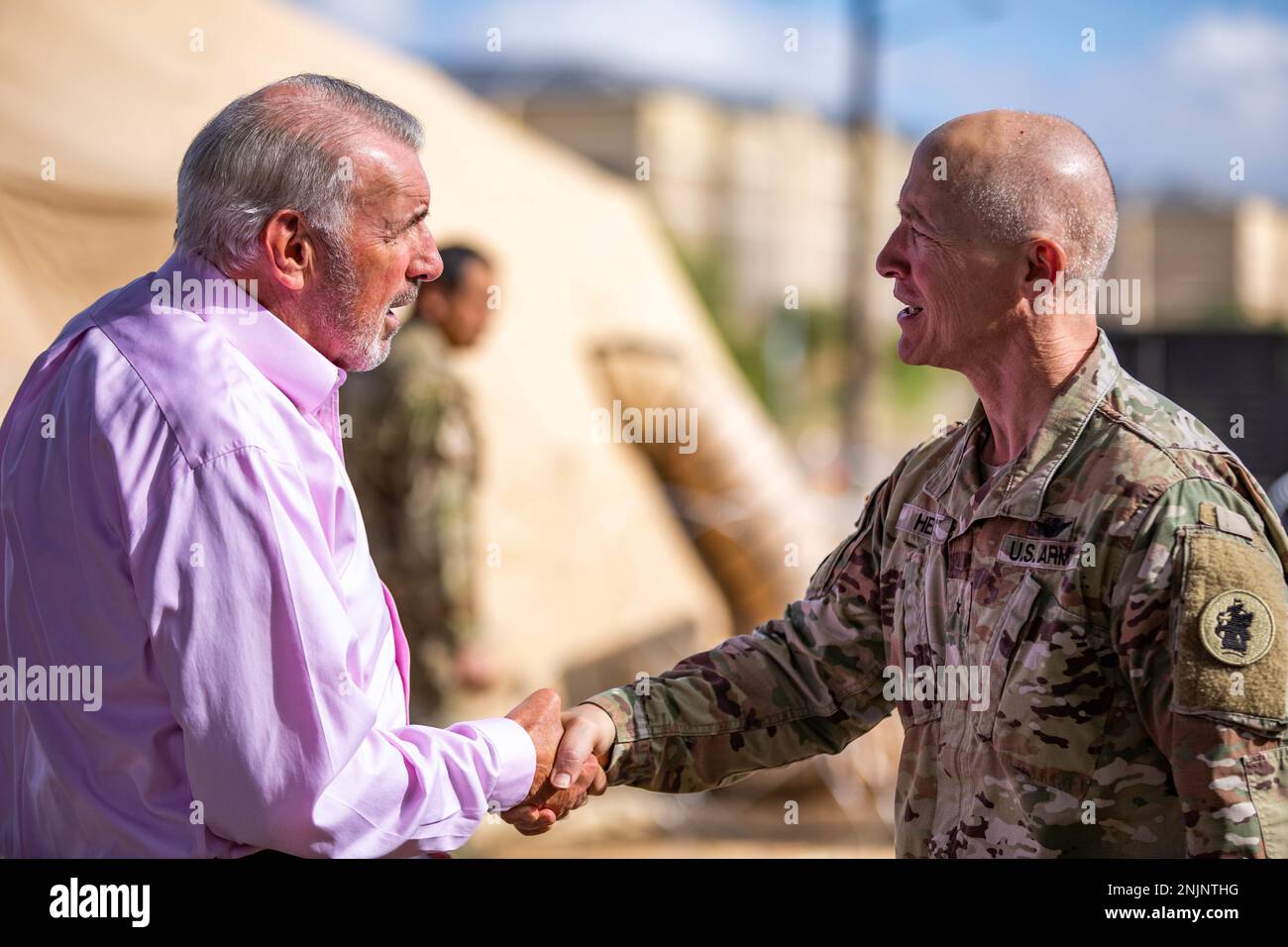 Civilian Aide to the Secretary of the Army, Mr. Joseph Bray, shakes ...