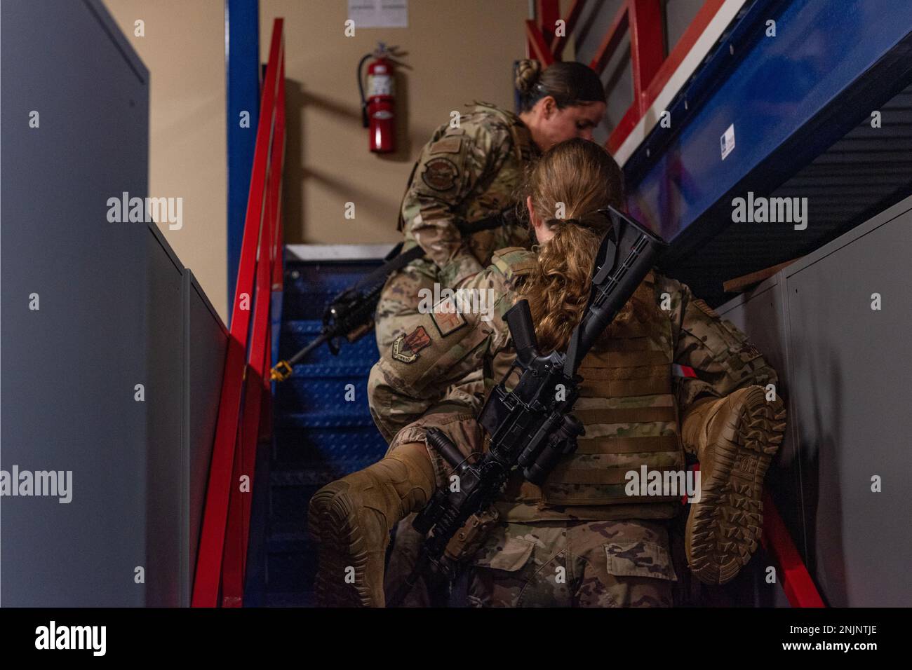 U.S. Air Force Master Sgt. Ana Ramirez, front, 23rd Security Forces ...