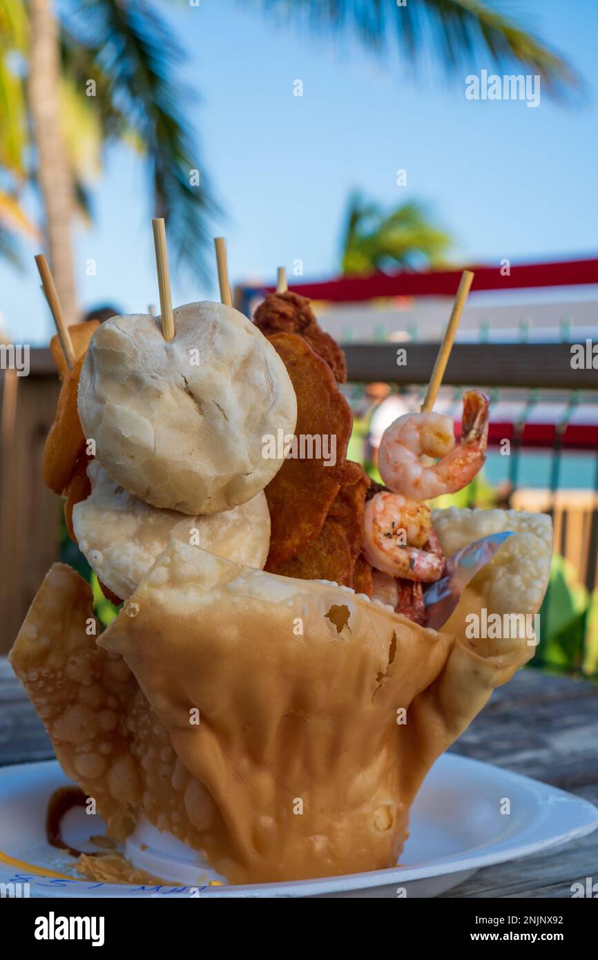 Puerto Rico street food of seafood mix on fry Doug cup Stock Photo - Alamy