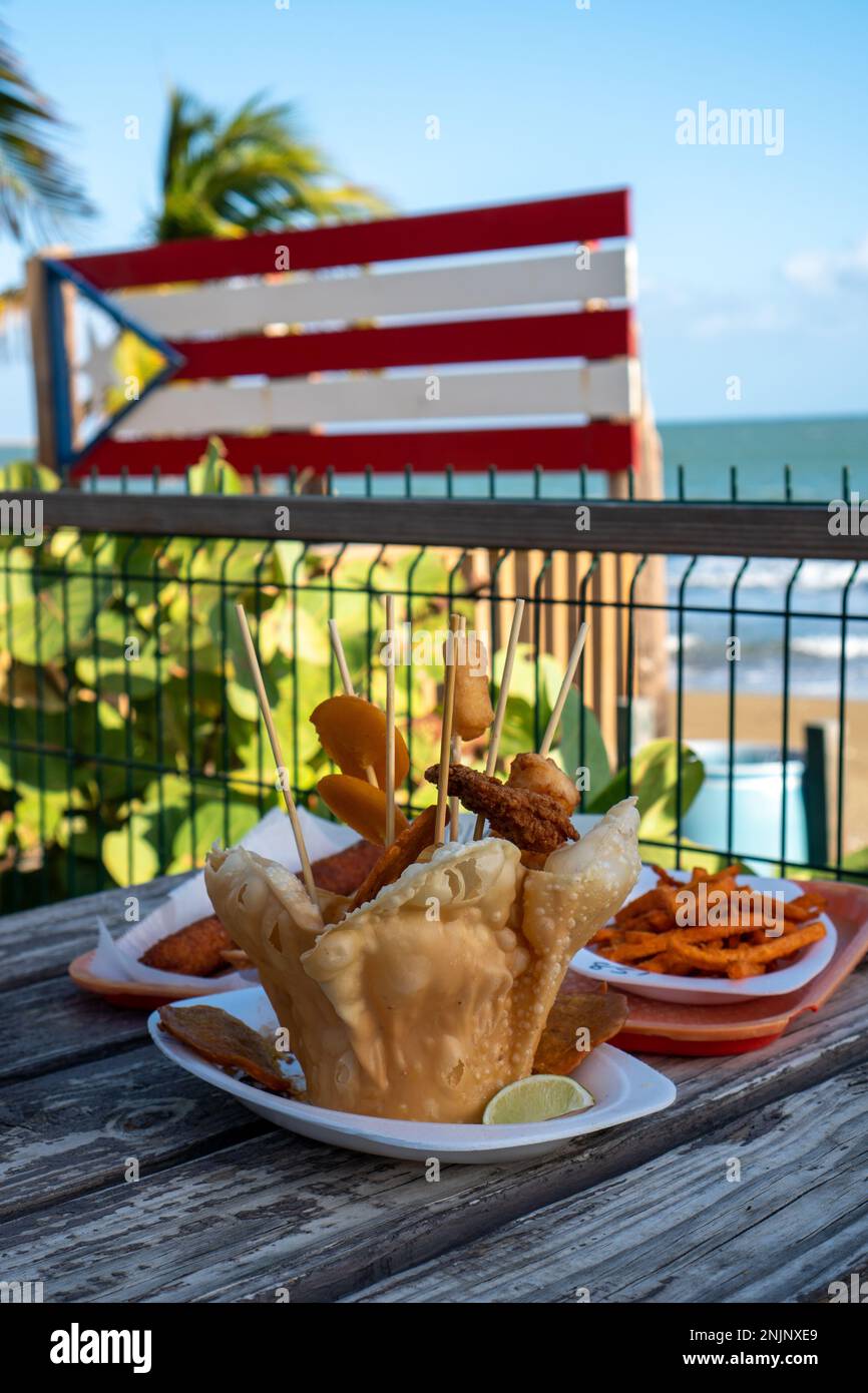 Puerto Rico street food of seafood mix on fry Doug cup Stock Photo - Alamy