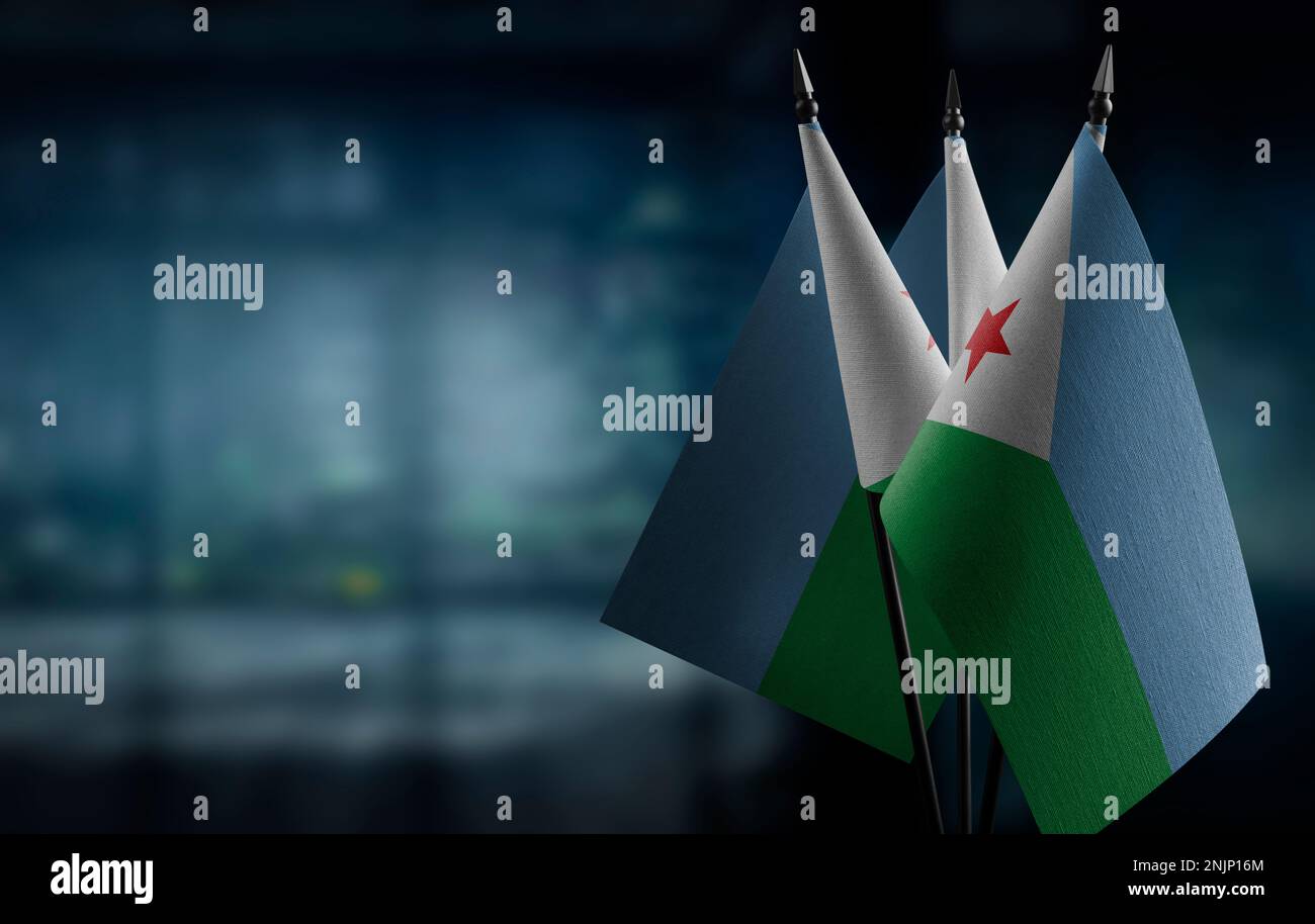 Small flags of the Djibouti on an abstract blurry background Stock ...