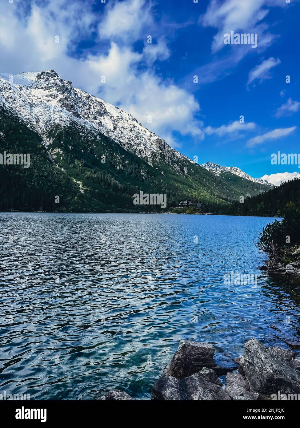 Morskie Oko lake Snowy Mountain Hut in Polish Tatry mountains, Zakopane ...