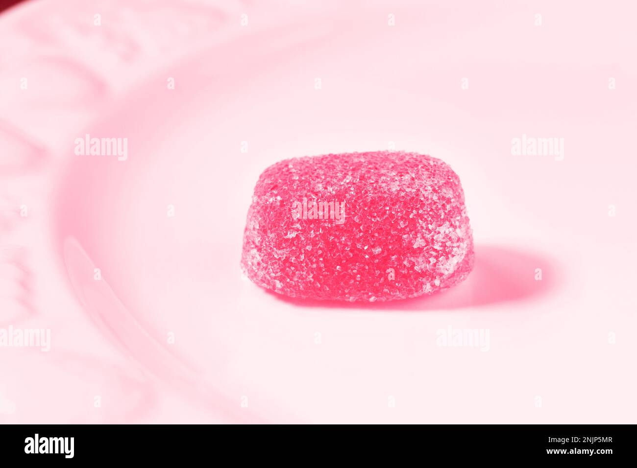 Red sugar fruit candy in plate ,ready to eat unhealthy sweets Stock ...