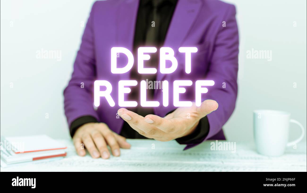 Sign displaying Debt Relief. Word Written on partial or total remission ...