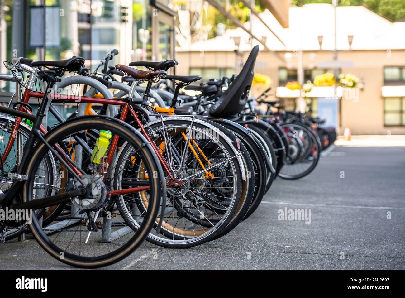 Row of the city bicycles ready to go and make urban city trips are ...