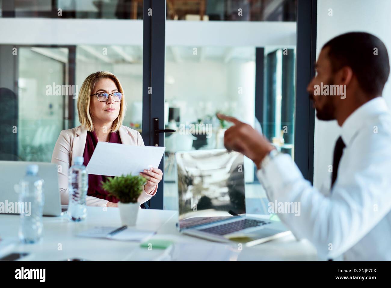 Lets discuss these documents. businesspeople in the workplace Stock ...