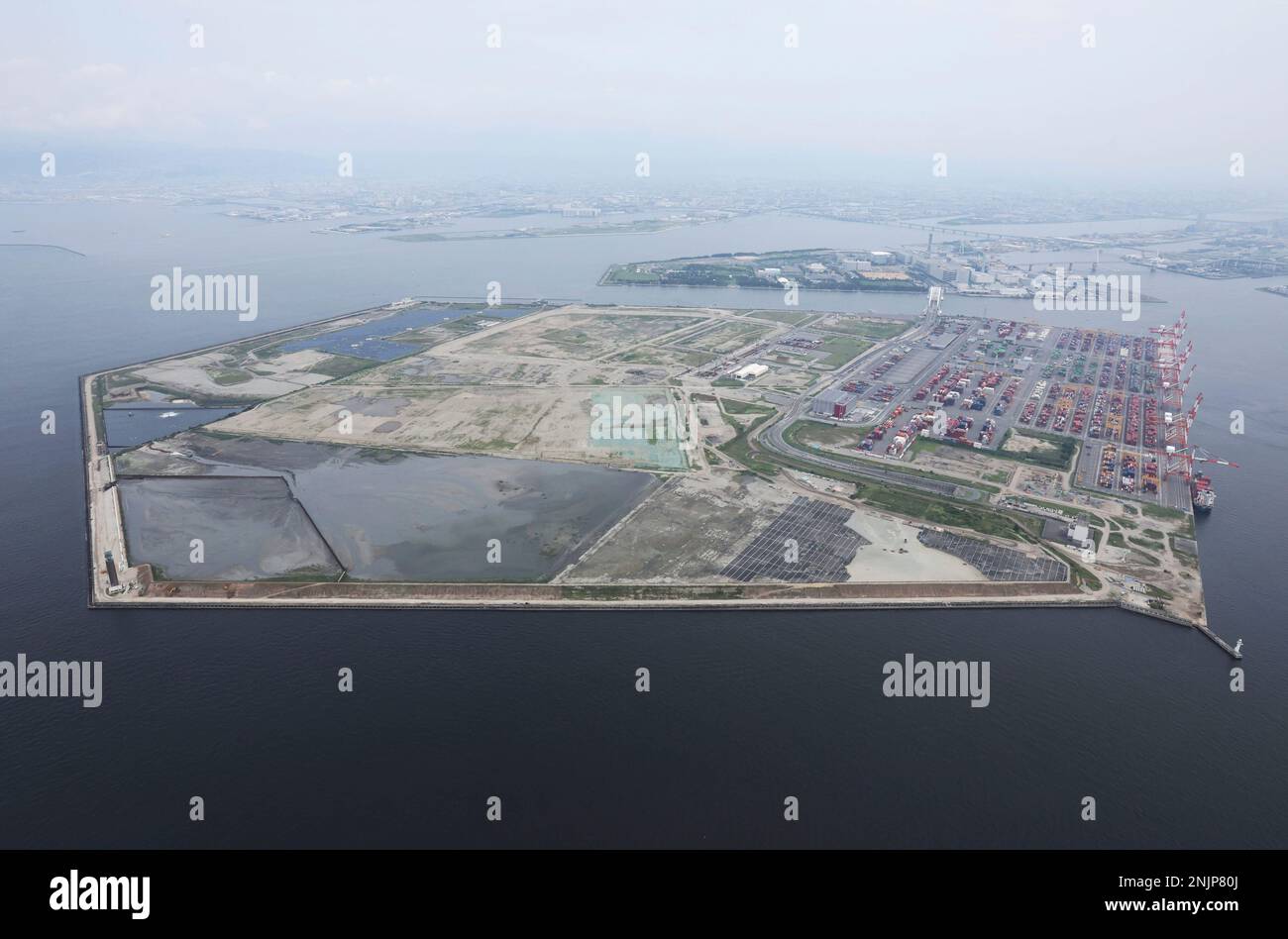An aerial photo shows an artificial island of Yumeshima, a venue of the ...