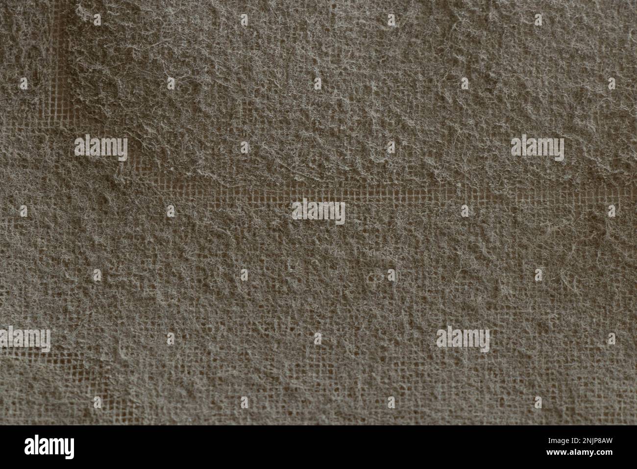 dust on the protective mesh of the air conditioner as a background ...