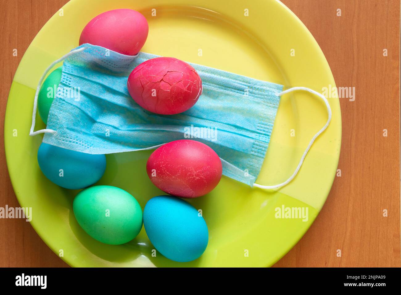 medical mask and on it lies an Easter egg for Easter during Stock Photo ...