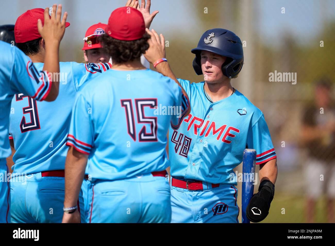 Bryce Blaser high fives teammates during the WWBA World Championship at ...