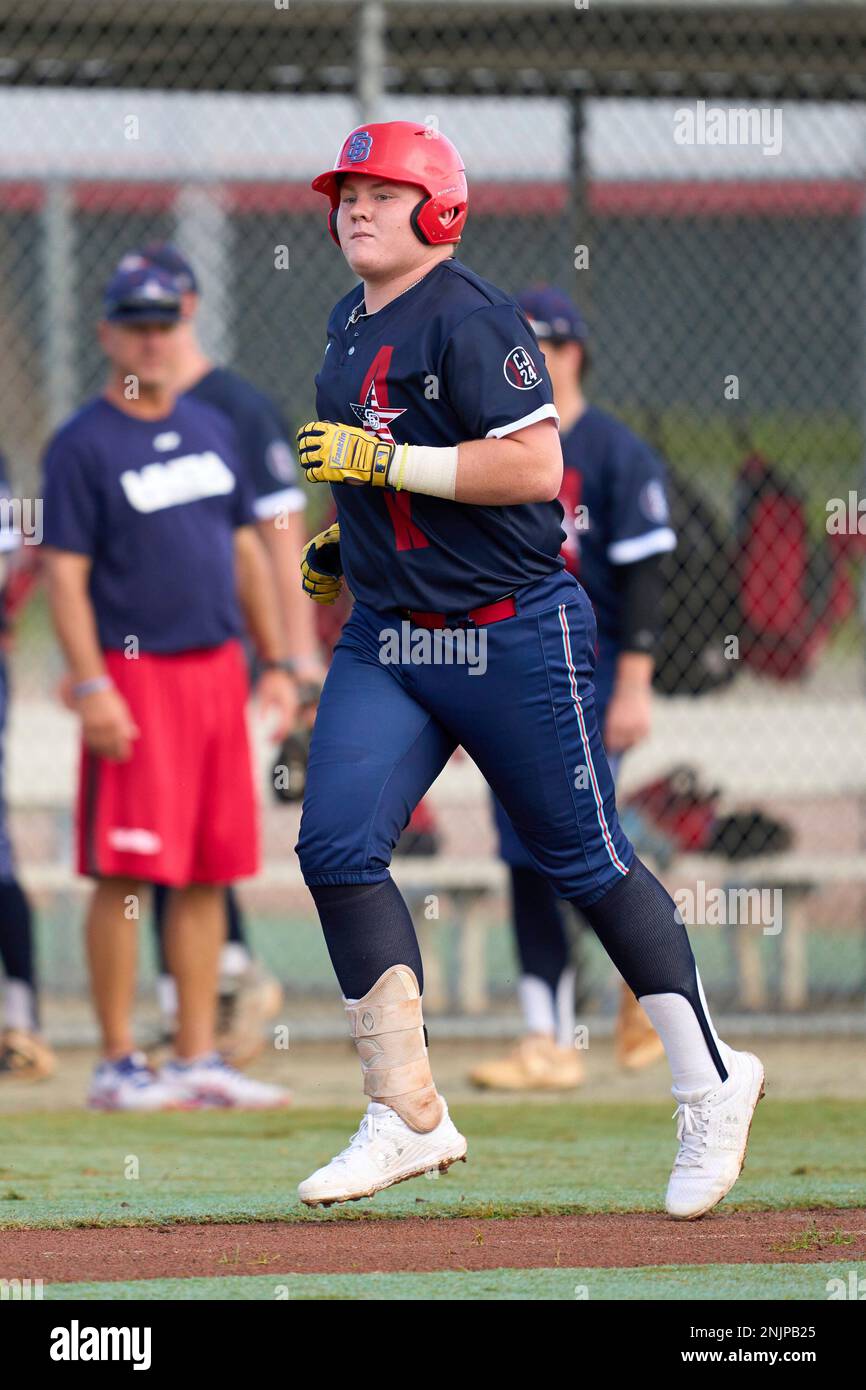 Jay Murdock rounds the bases after hitting a home run during the WWBA World Championship at ...