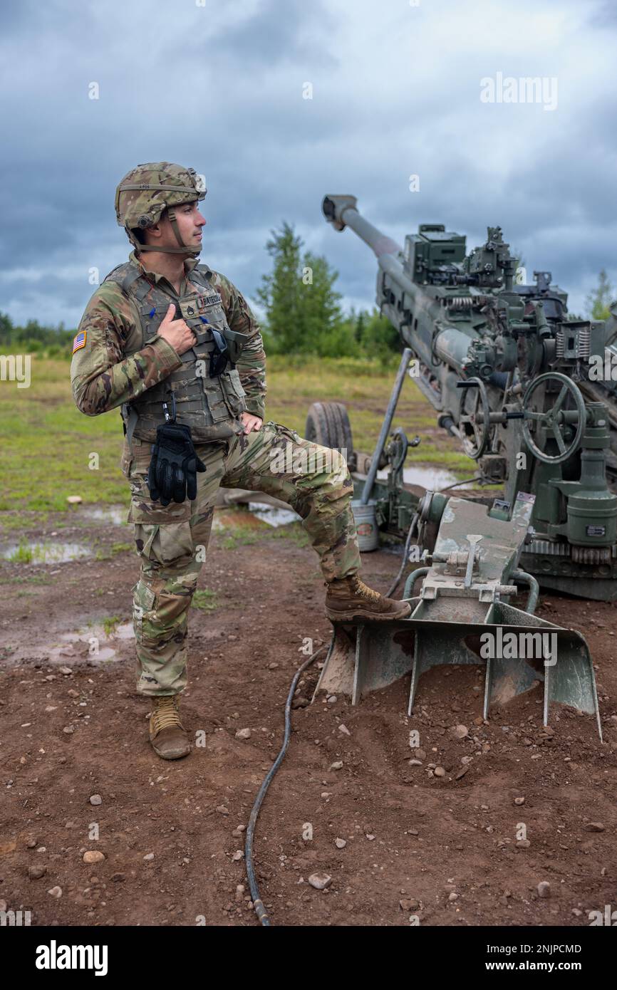 Staff Sergeant Alexander Abatecola poses with his M777 howitzer. CFB ...