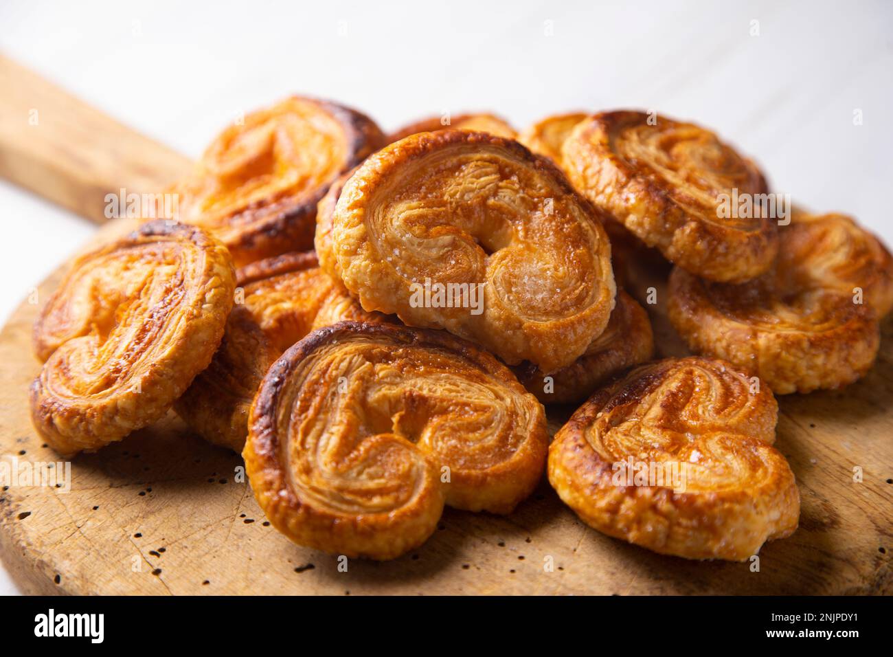 The palmera, palmerita, oreja, orejita, palmita or puff pastry heart is ...