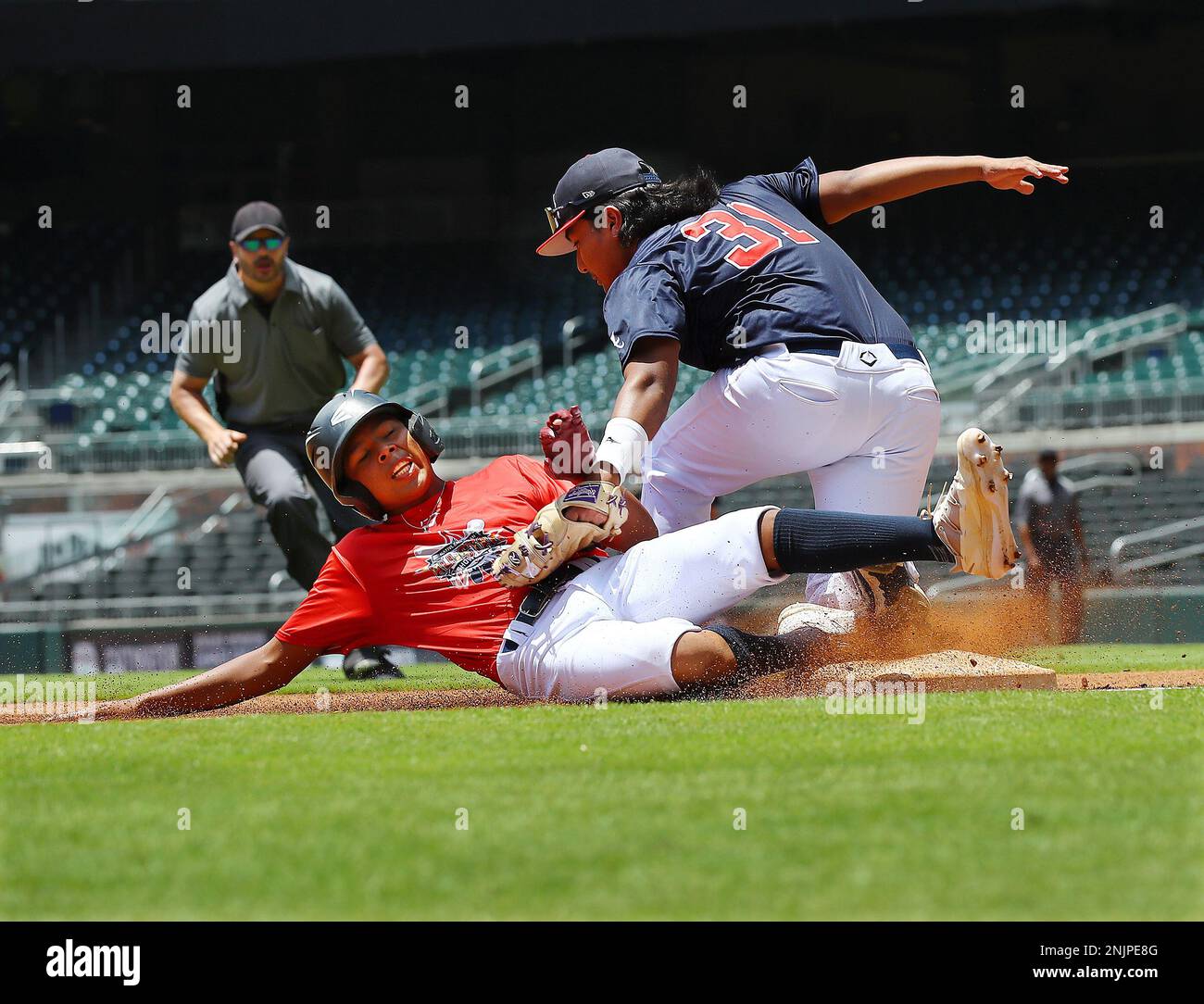 Kethan Anderson, left, Mississippi Band of Choctaw Indians, steals ...