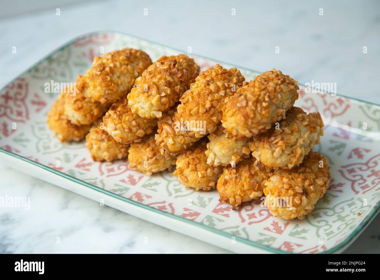 Penellets. Small sweets of various shapes, made from almond and potato ...