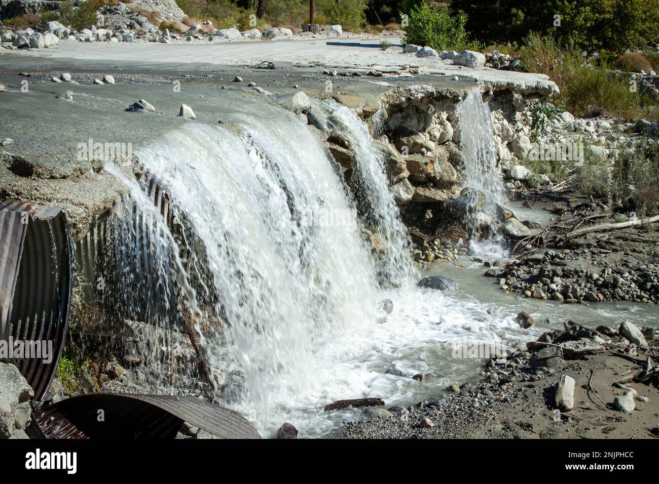Collapse of a road after a quake is now a waterfall Stock Photo - Alamy
