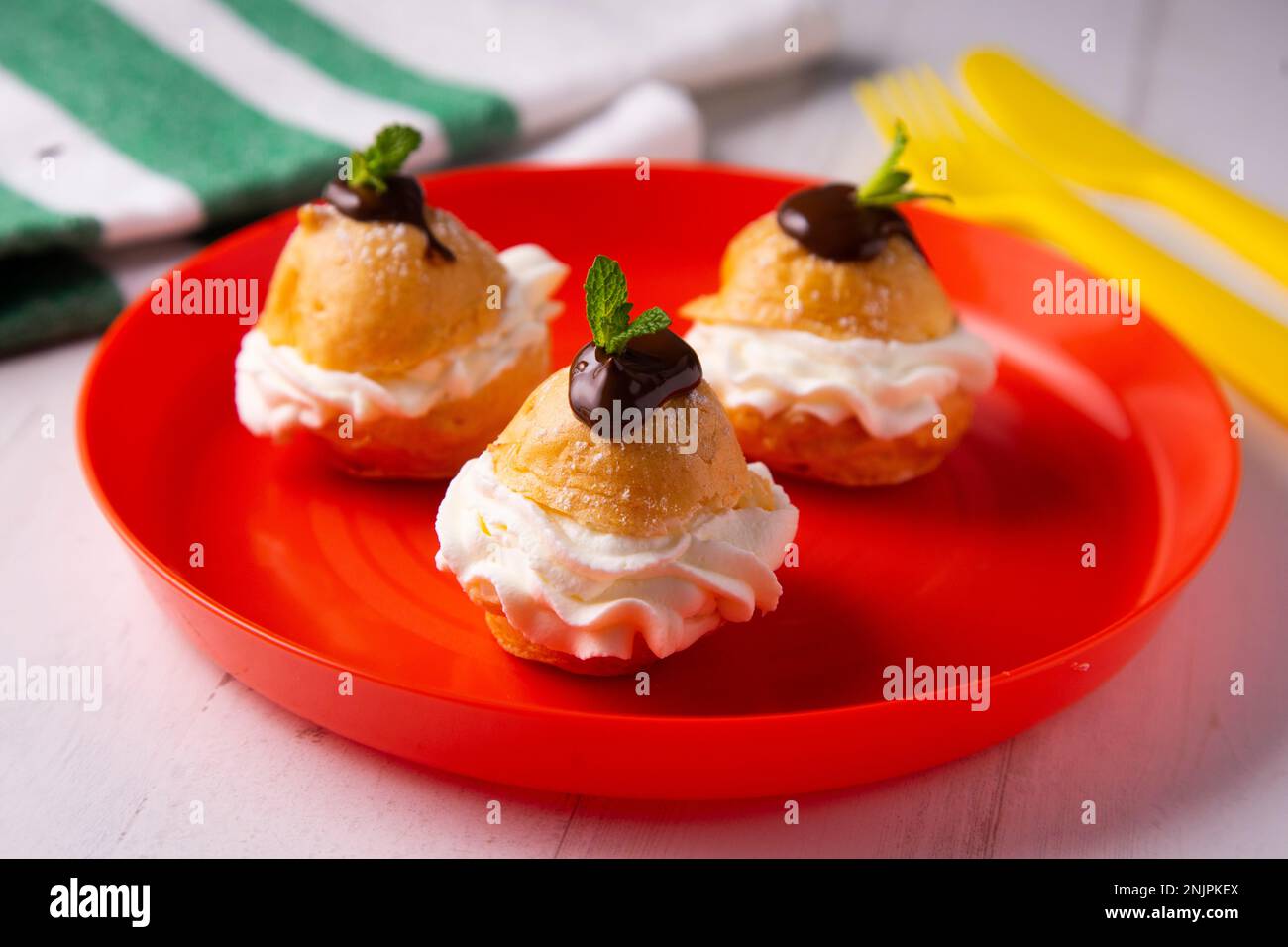 The profiteroles or petisús are balls made with choux pastry that are ...