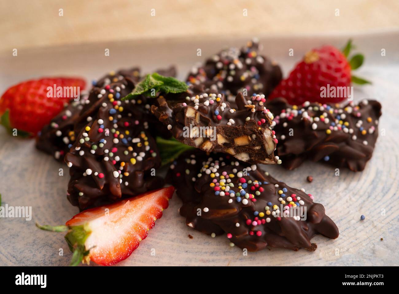 Chocolate rocks with toasted almonds. Traditional Spanish dessert Stock ...