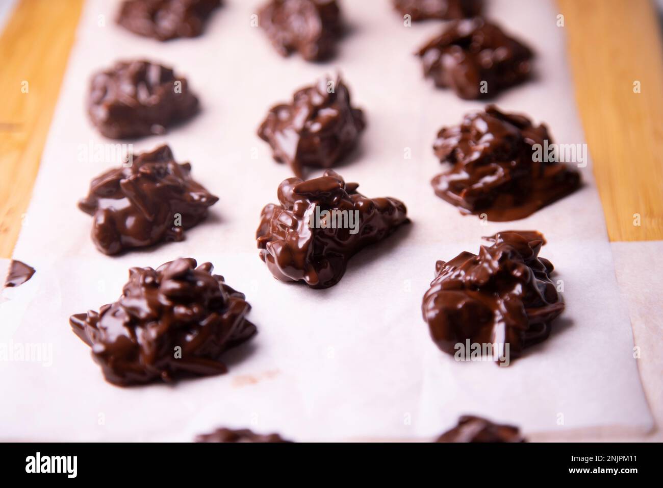 Chocolate rocks with toasted almonds. Traditional Spanish dessert Stock ...