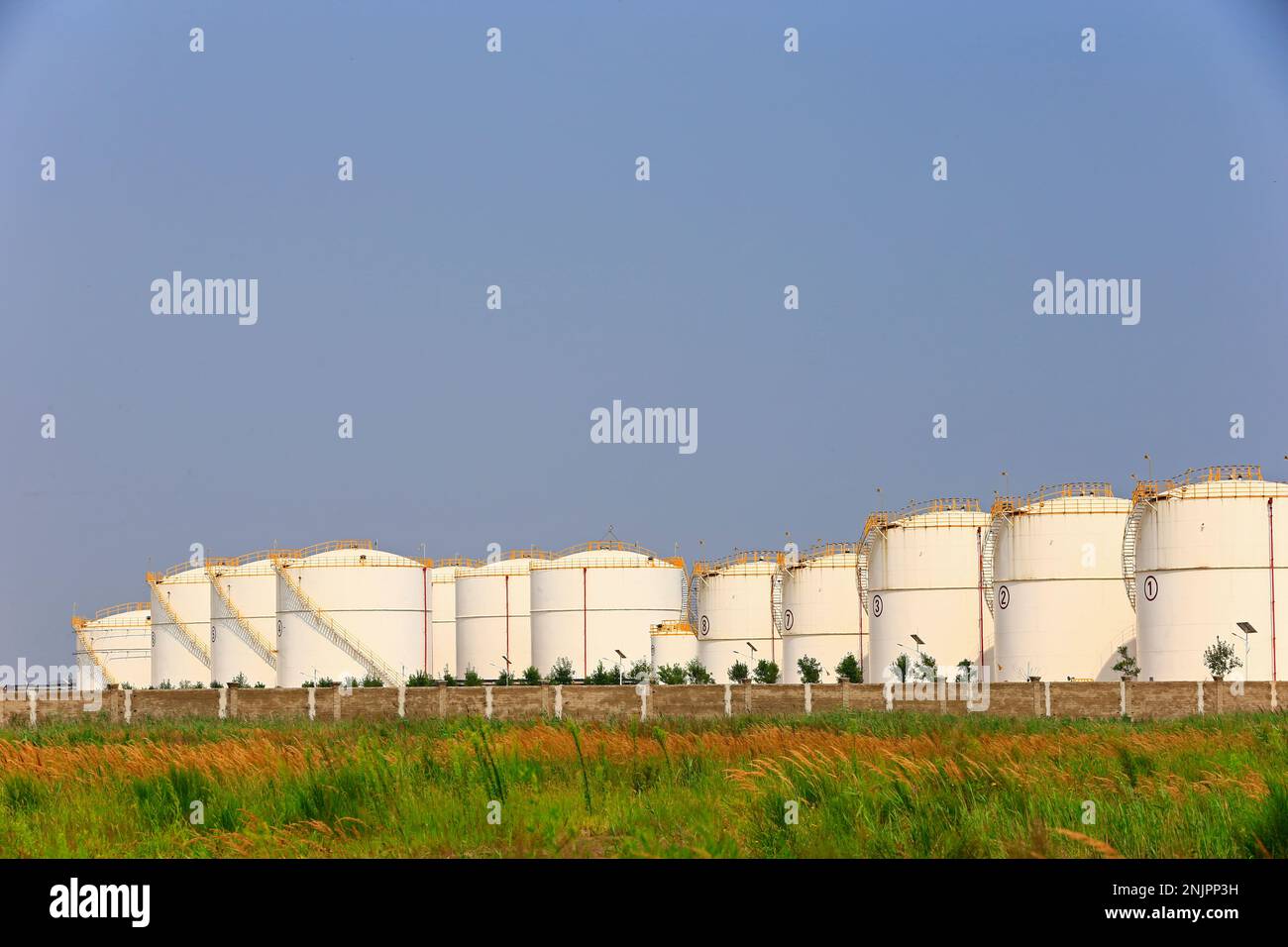Oil storage tank, industrial equipment Stock Photo - Alamy