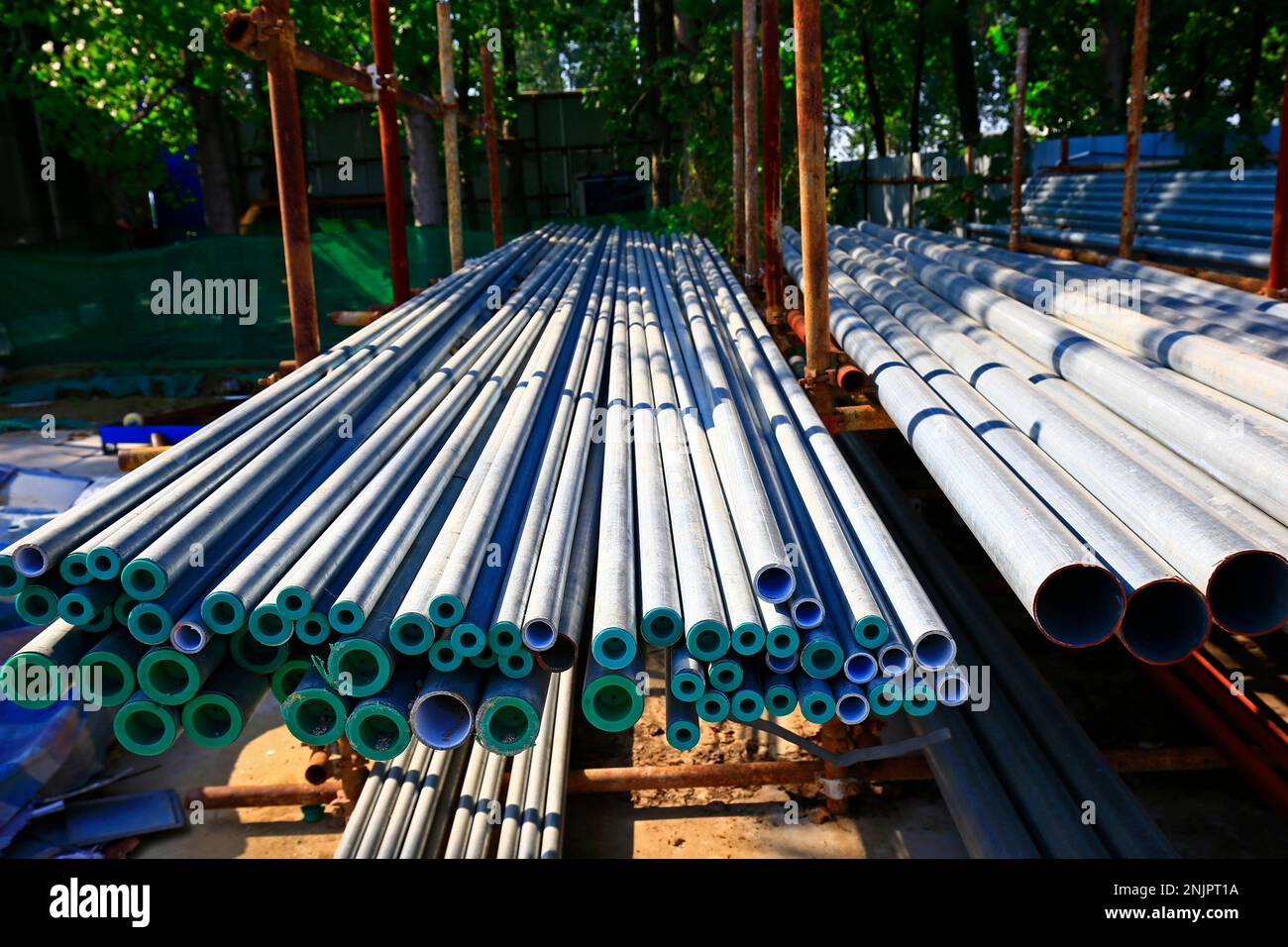 Stacked in the steel tube Stock Photo - Alamy