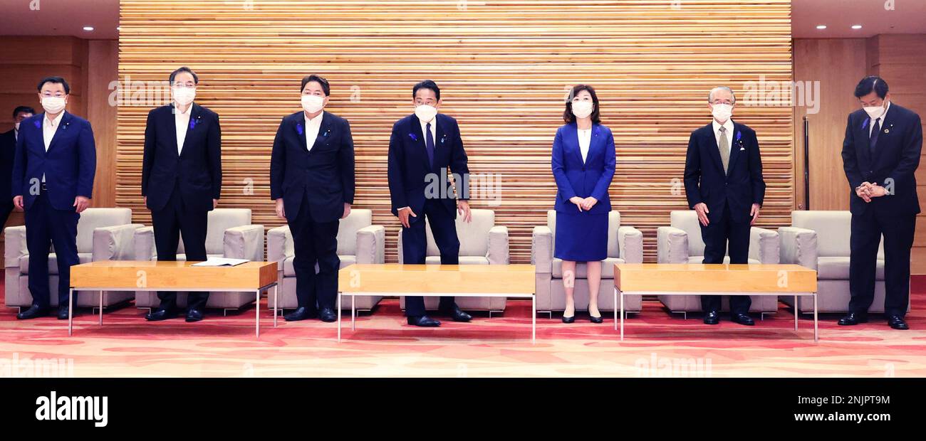 Japanese Prime Minister Fumio Kishida (C) attends a cabinet meeting at ...