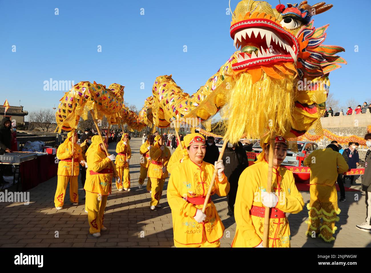 Qinhuangdao City, China, 21 February, 2023. People perform dragon and ... Qinhuangdao City, China, 21 February, 2023. People perform dragon and ...