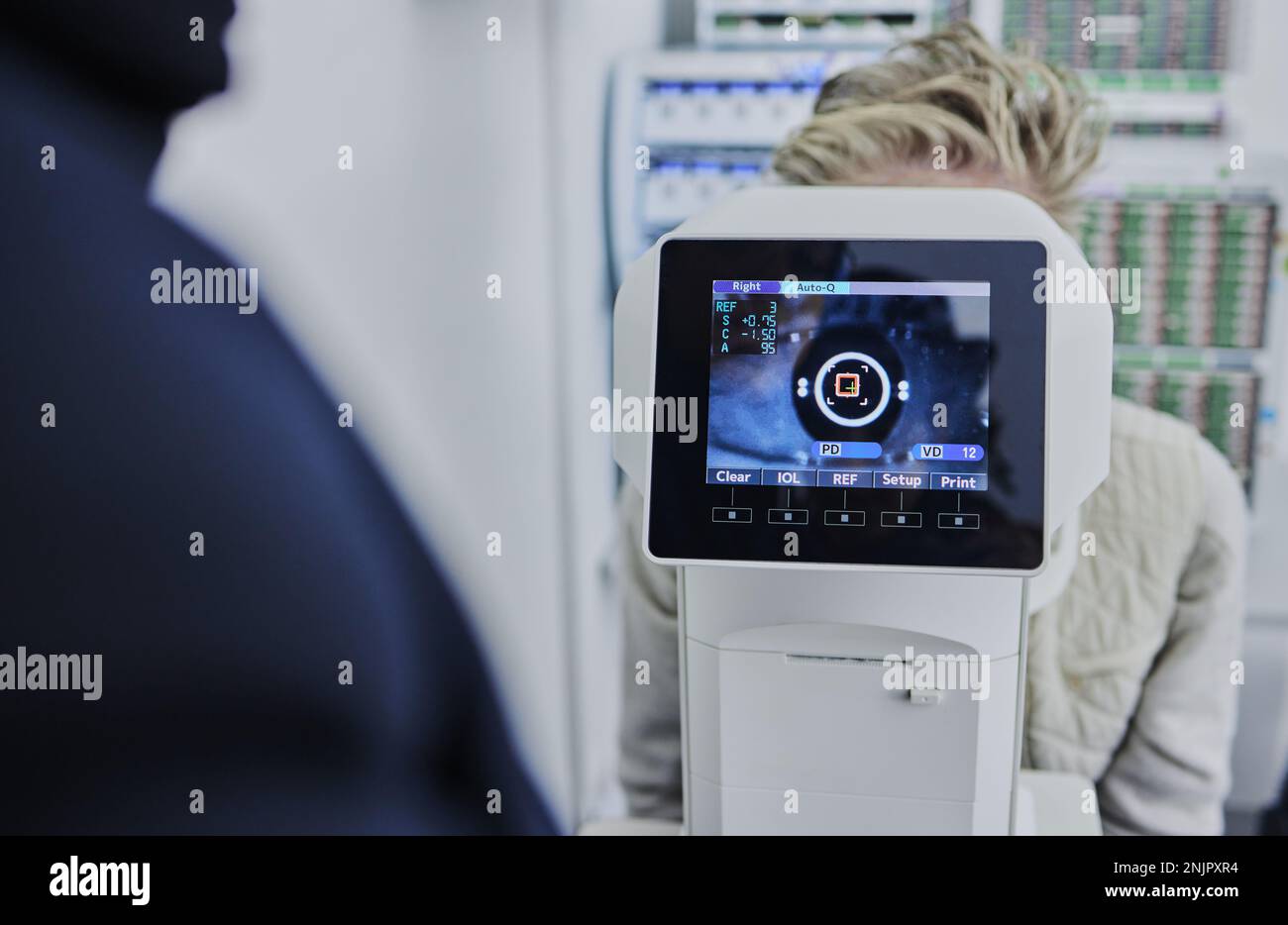 Optometry, digital screen for eye exam and woman with machine for ...