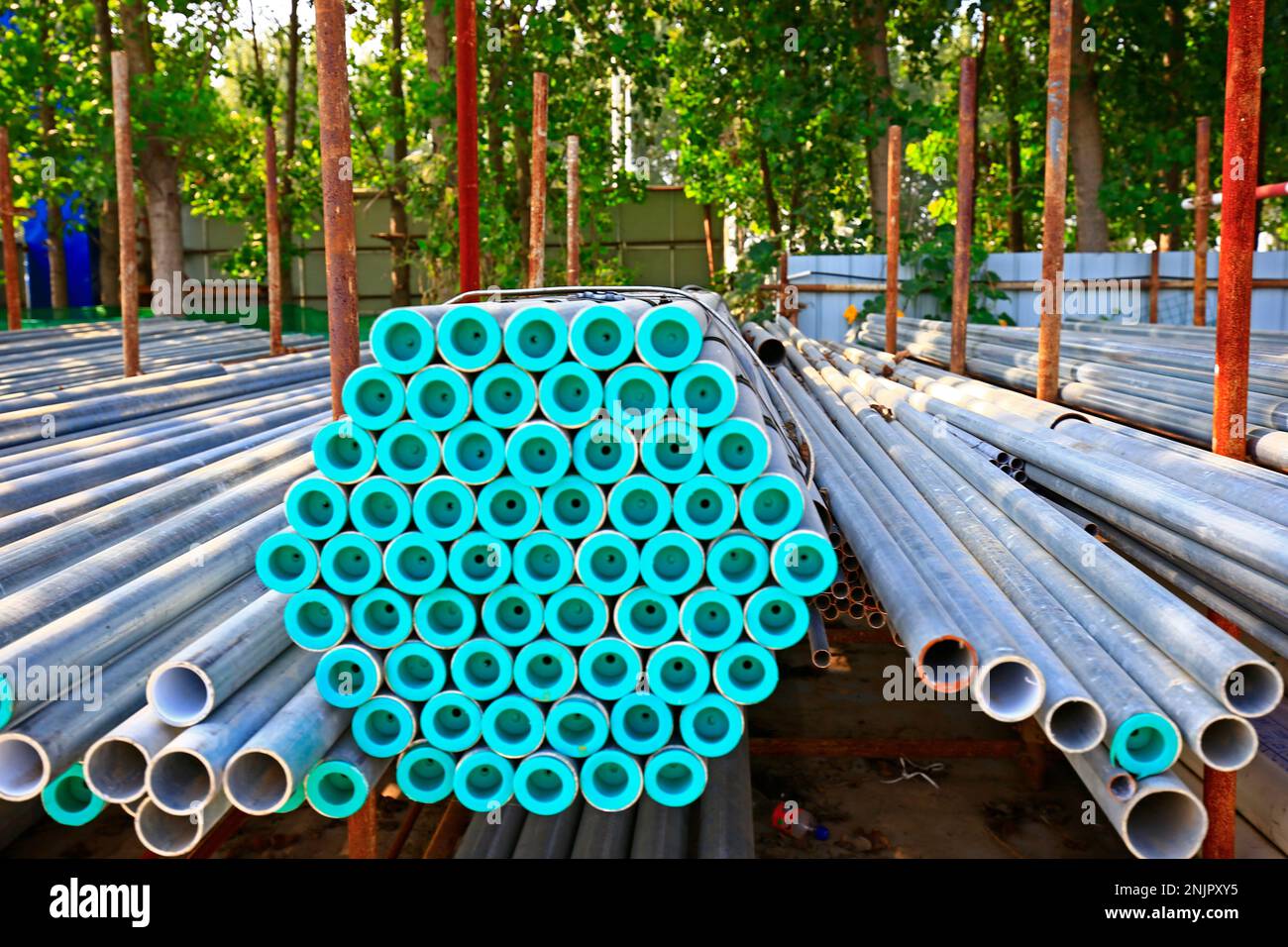 Stacked in the steel tube Stock Photo - Alamy