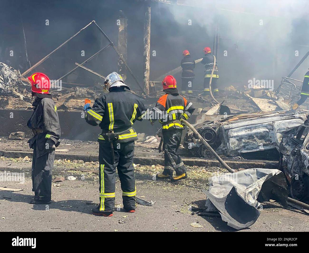 In this photo provided by the Ukrainian Emergency Service, firefighters ...