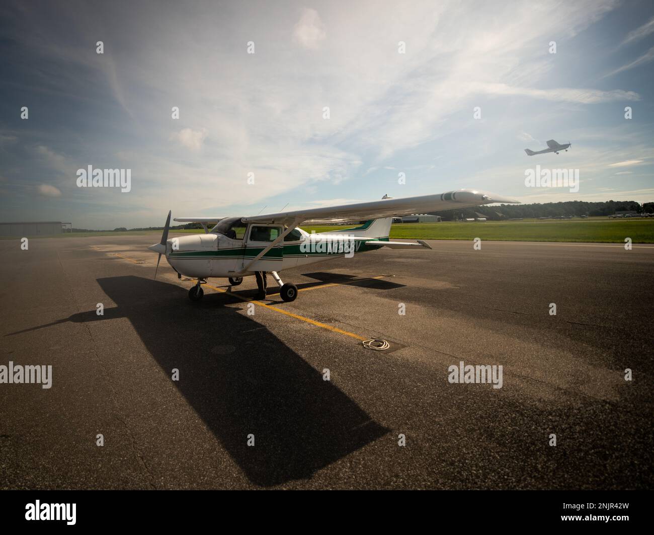 Cessna Plane ready for the students to fly, while a student practices ...