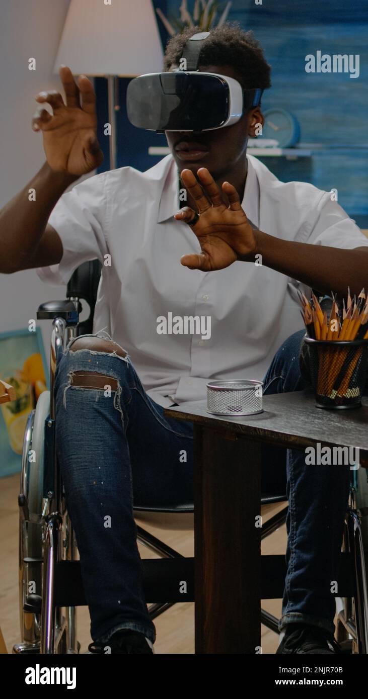Disabled african american man using vr glasses for inspiration and ...