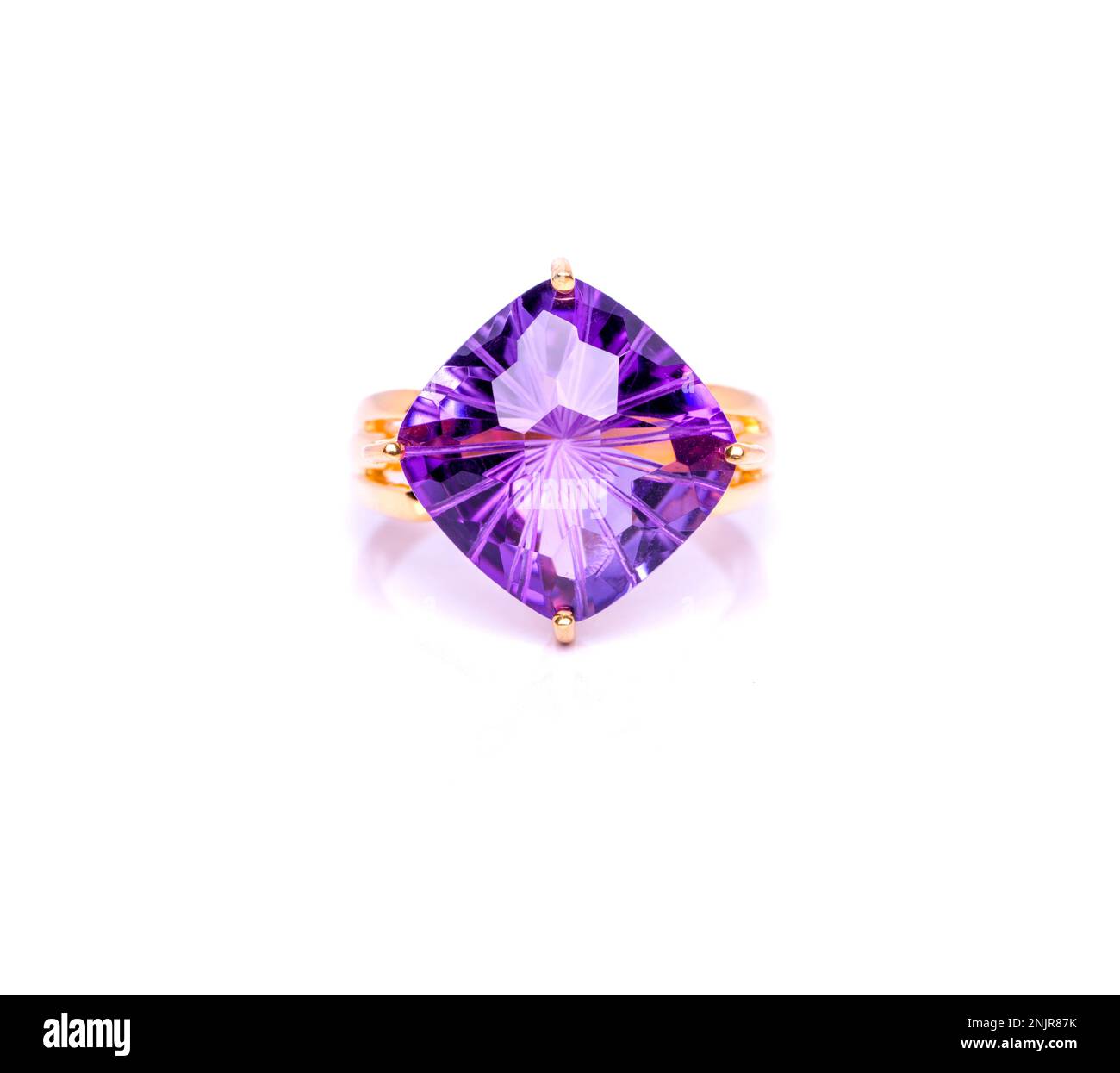Amethyst Jewel or gems ring on white background with reflection ...