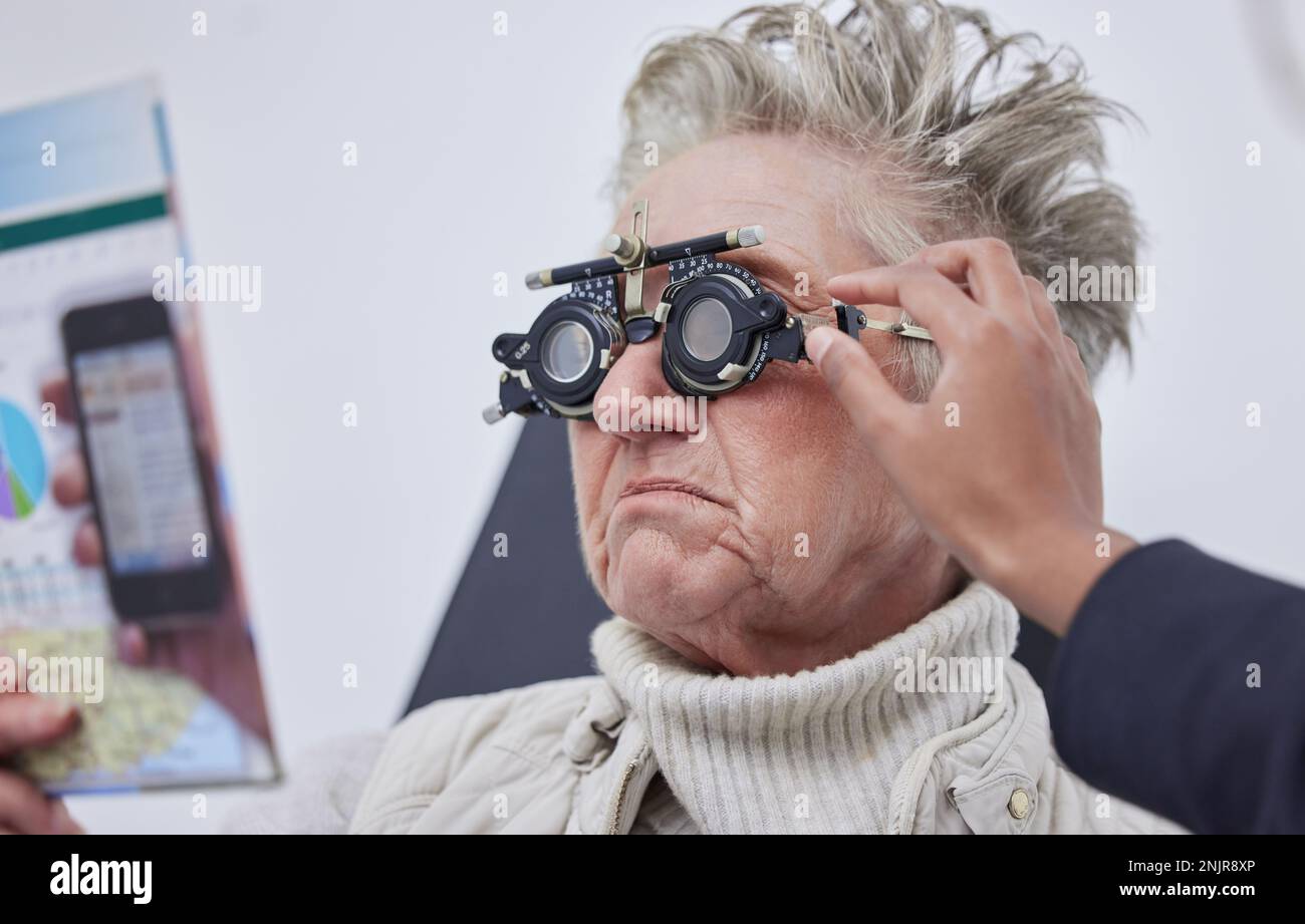 Vision, trial frame and woman for eye exam in optometry clinic for test ...
