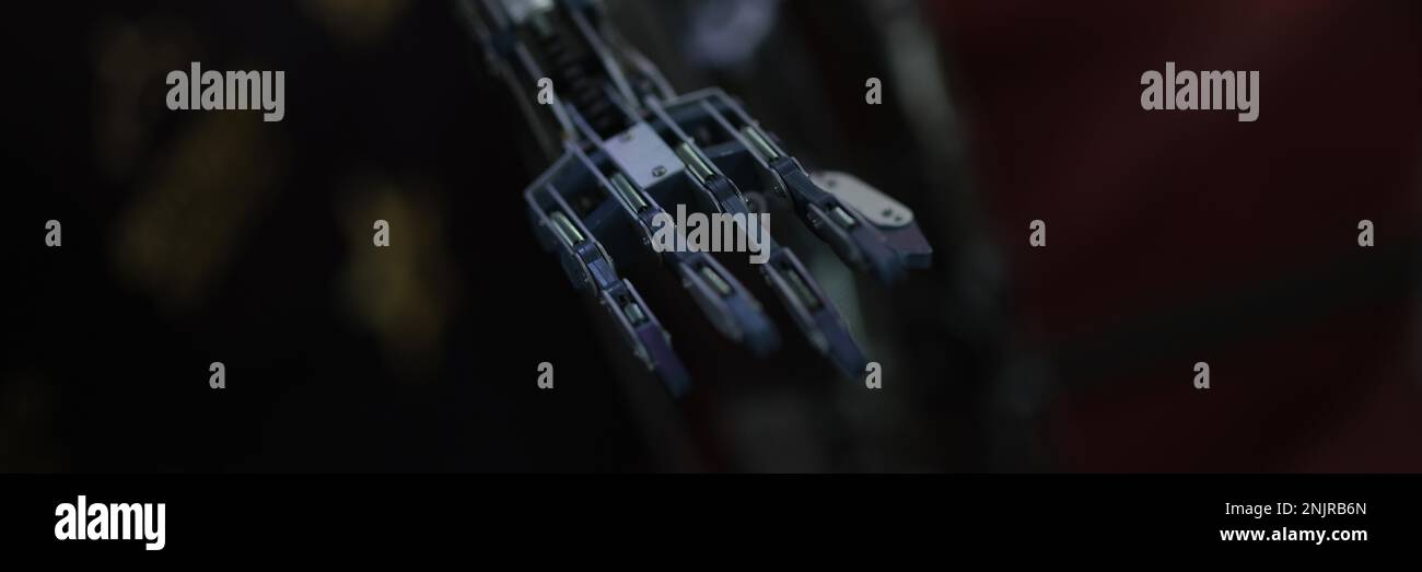 Artificial robot arm and robotic prosthesis closeup. Creation of bionic ...