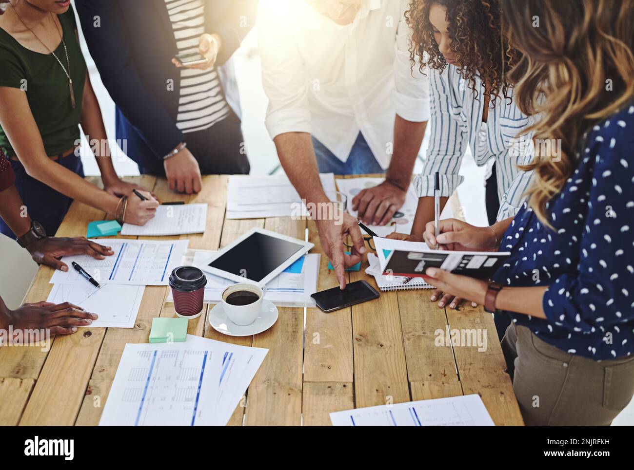 More hands equals more work being done. a group of unrecognizable ...