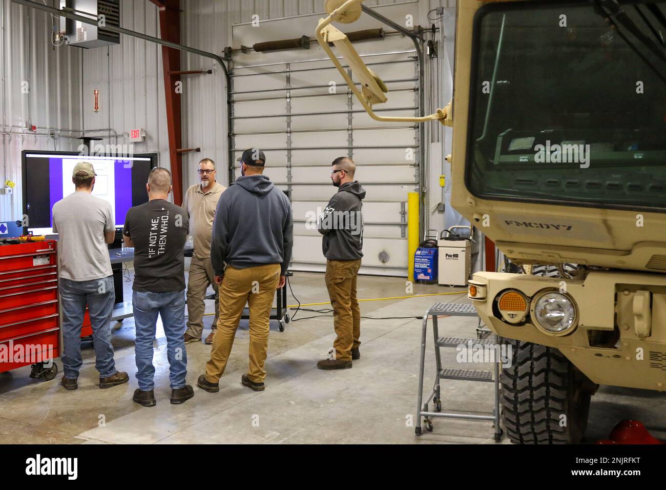Brant Amble, center, instructor, Fort McCoy Draw Yard, 88th Readiness ...