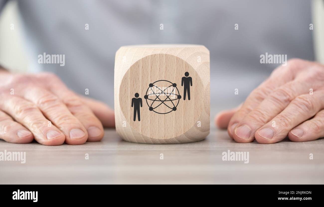Wooden block with symbol of social web concept Stock Photo - Alamy