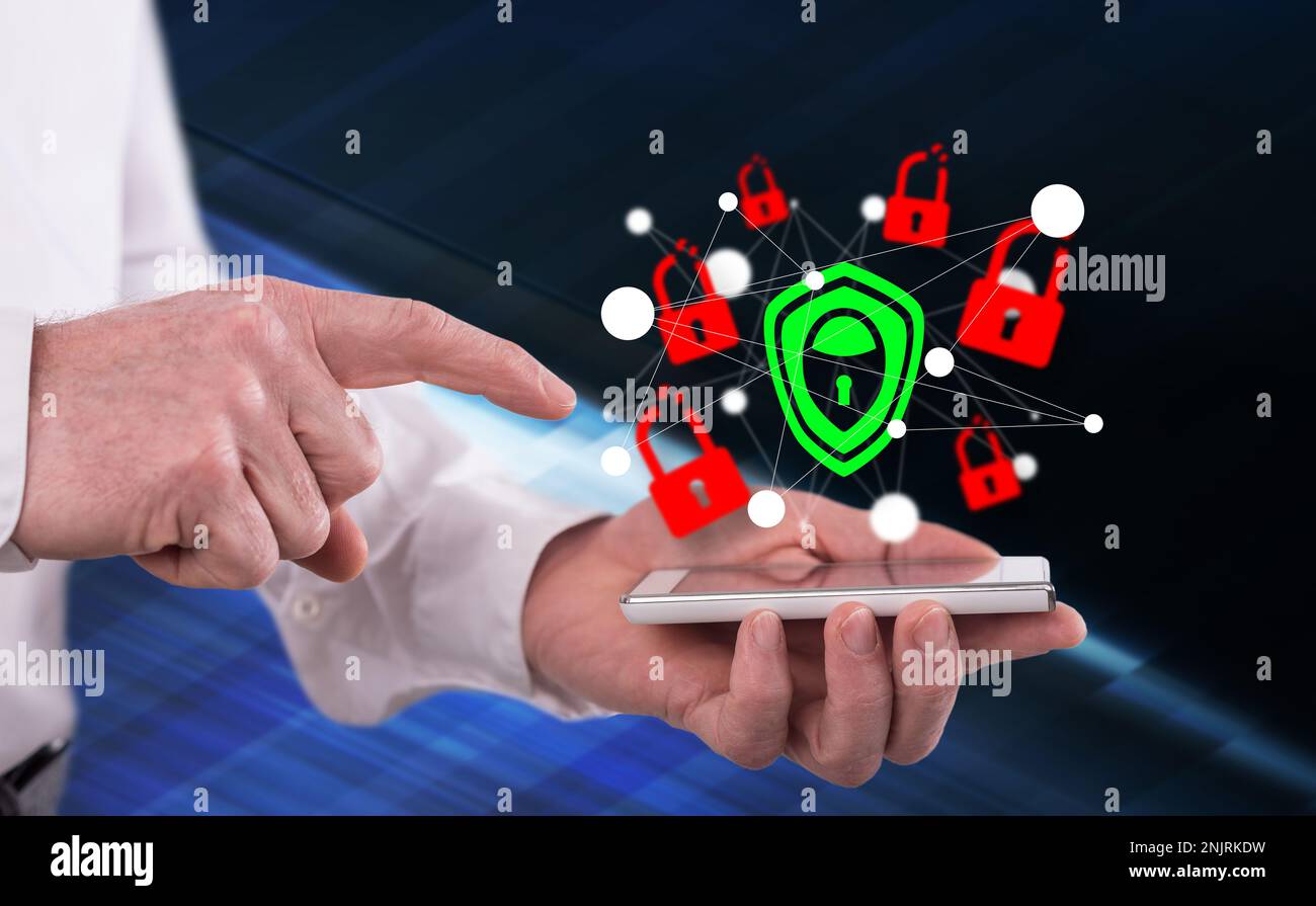 Cyber security concept above a smartphone held by a man Stock Photo - Alamy
