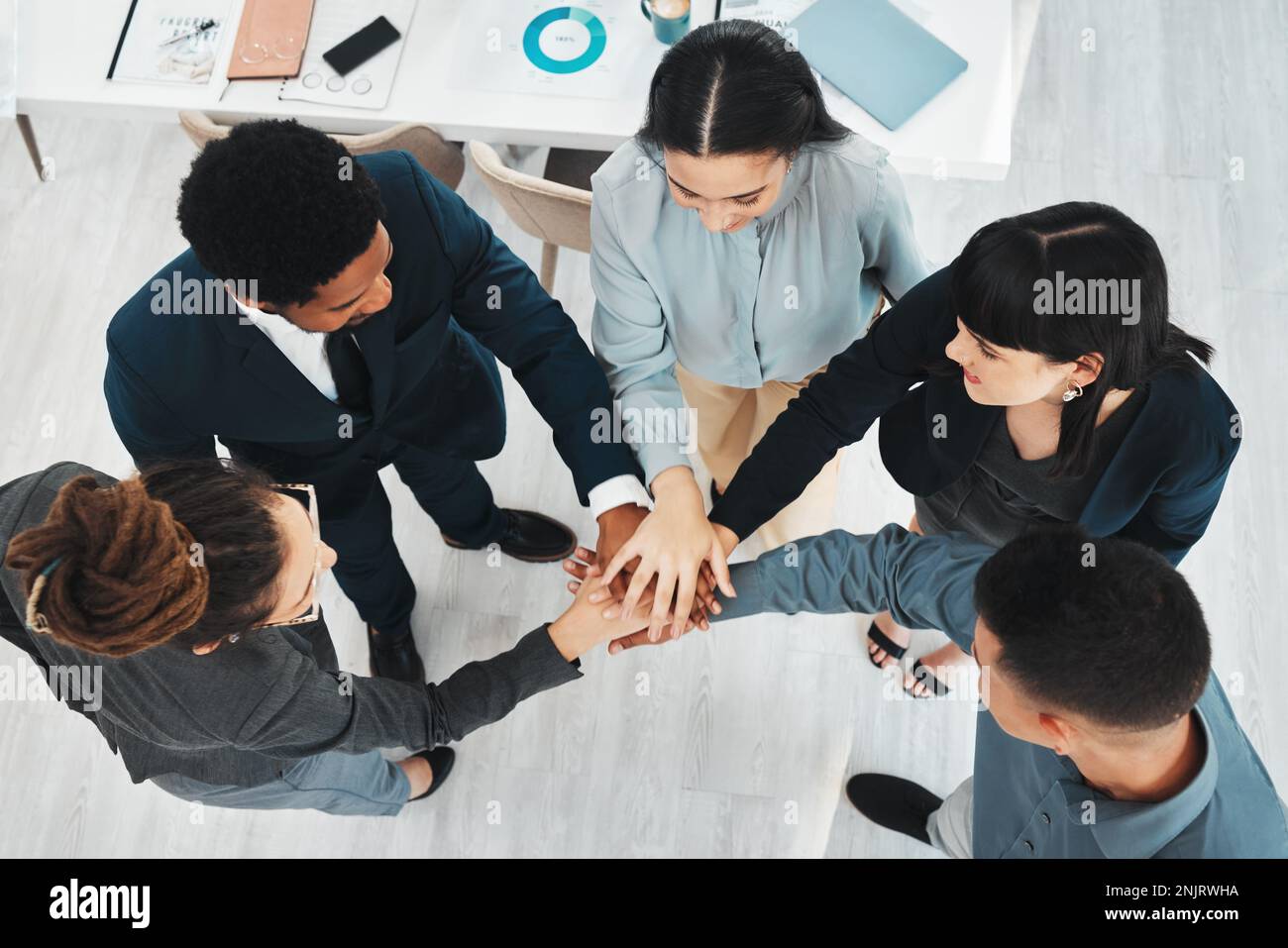Diversity, stack of hands and business people in the office with ...